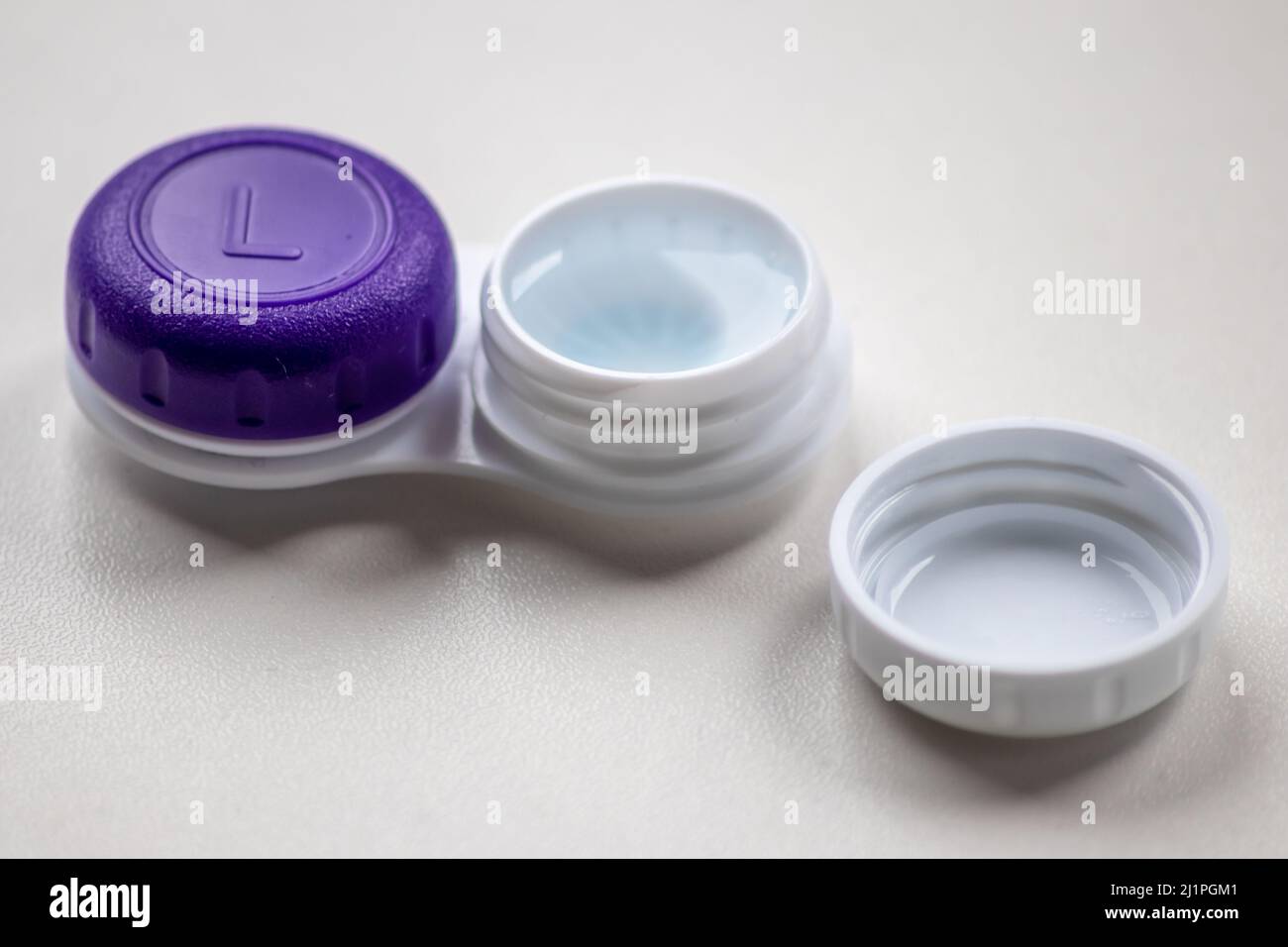 Contact lens container with contact lenses as optic alternative to ...