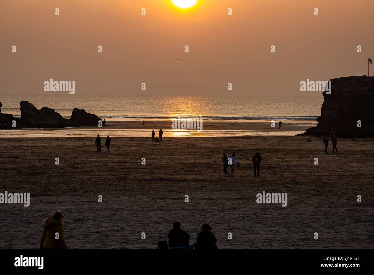 Perranporth sunset sea beach people hi-res stock photography and images ...