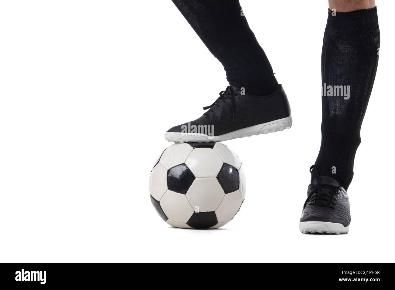 leg of soccer football player with ball isolated on white background ...