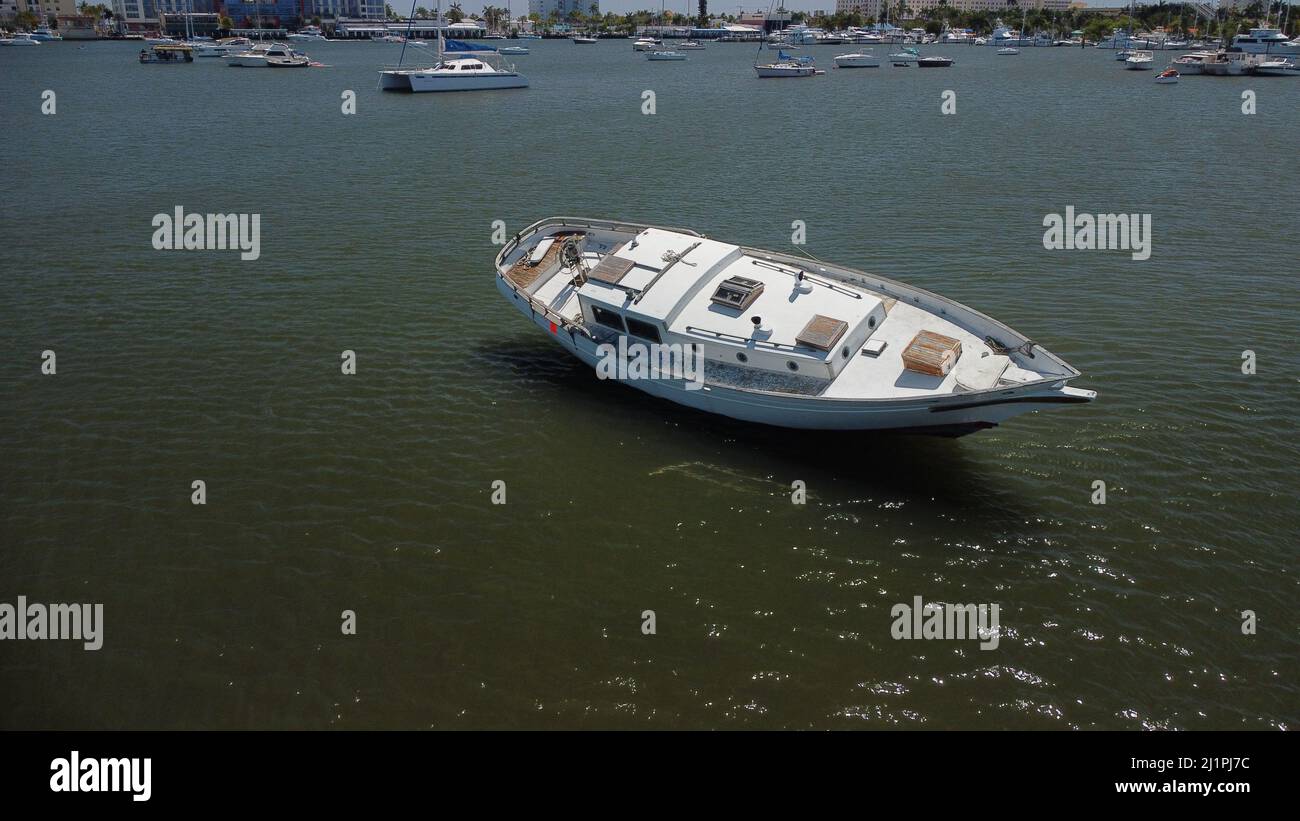 Capsized sailboat hi-res stock photography and images - Alamy