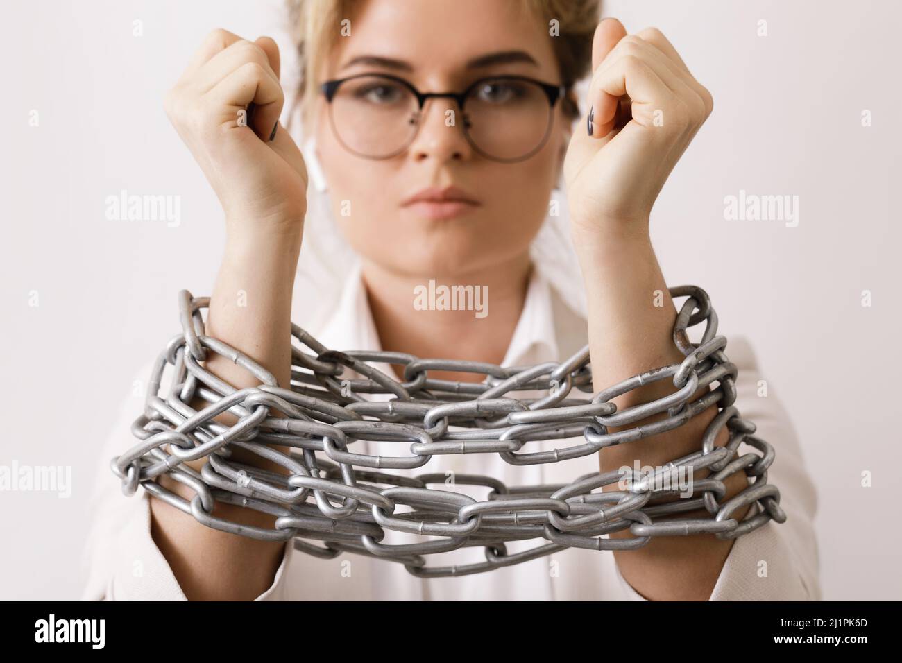 Woman tied chained hi-res stock photography and images - Alamy