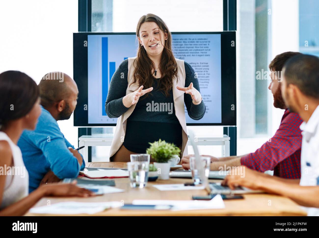 Shes great at these presentations. Cropped shot of a young female ...