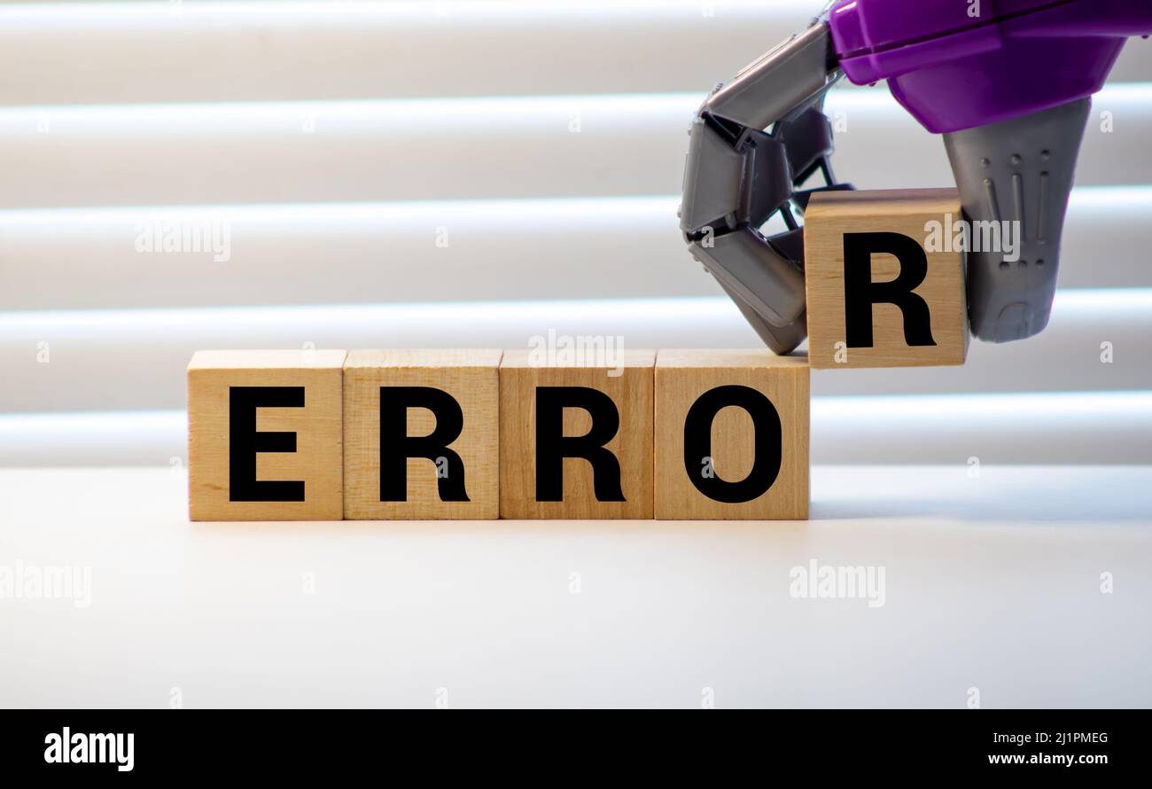 word error made from wooden letters lies on a red background Stock ...