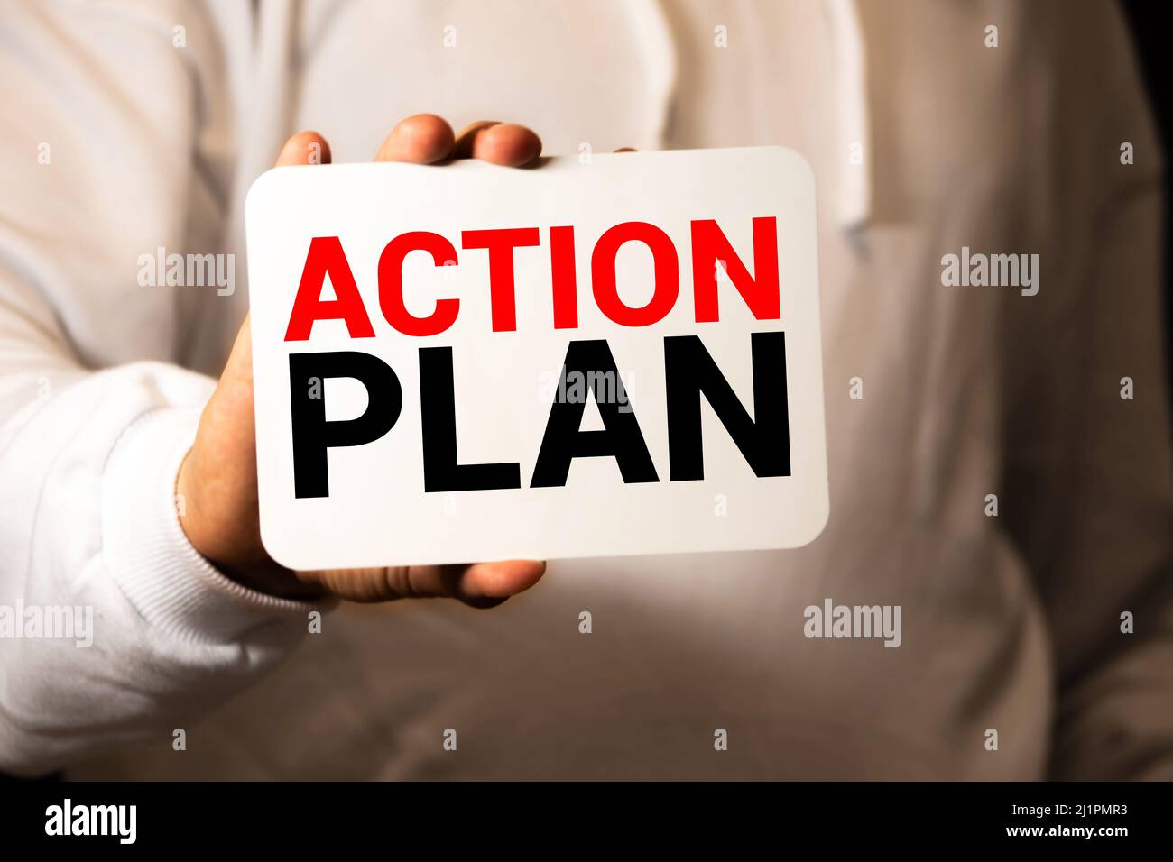 Action plan memo written on a notebook with pen Stock Photo - Alamy
