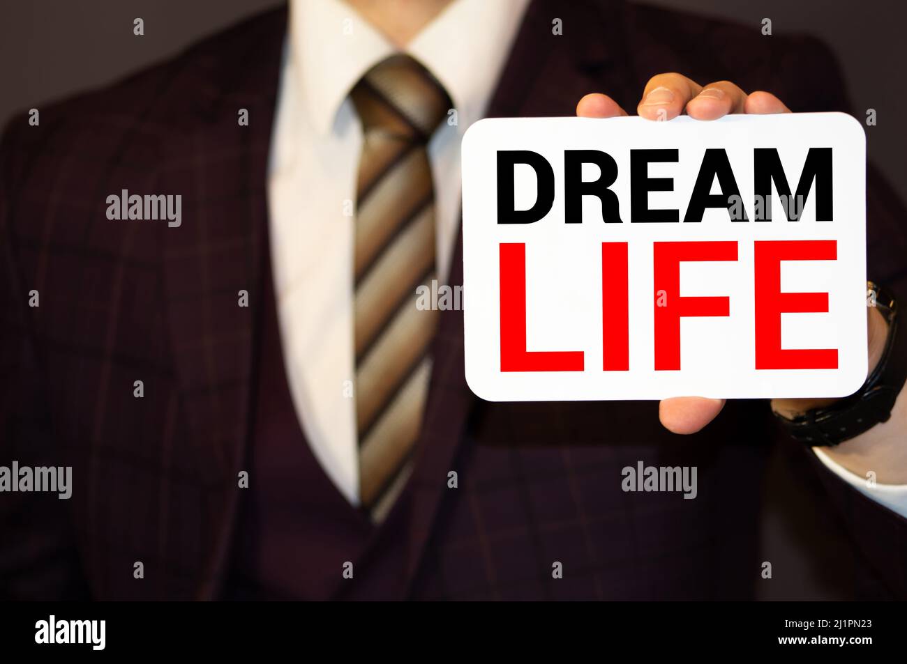 Dream Life card with a beach on background Stock Photo - Alamy