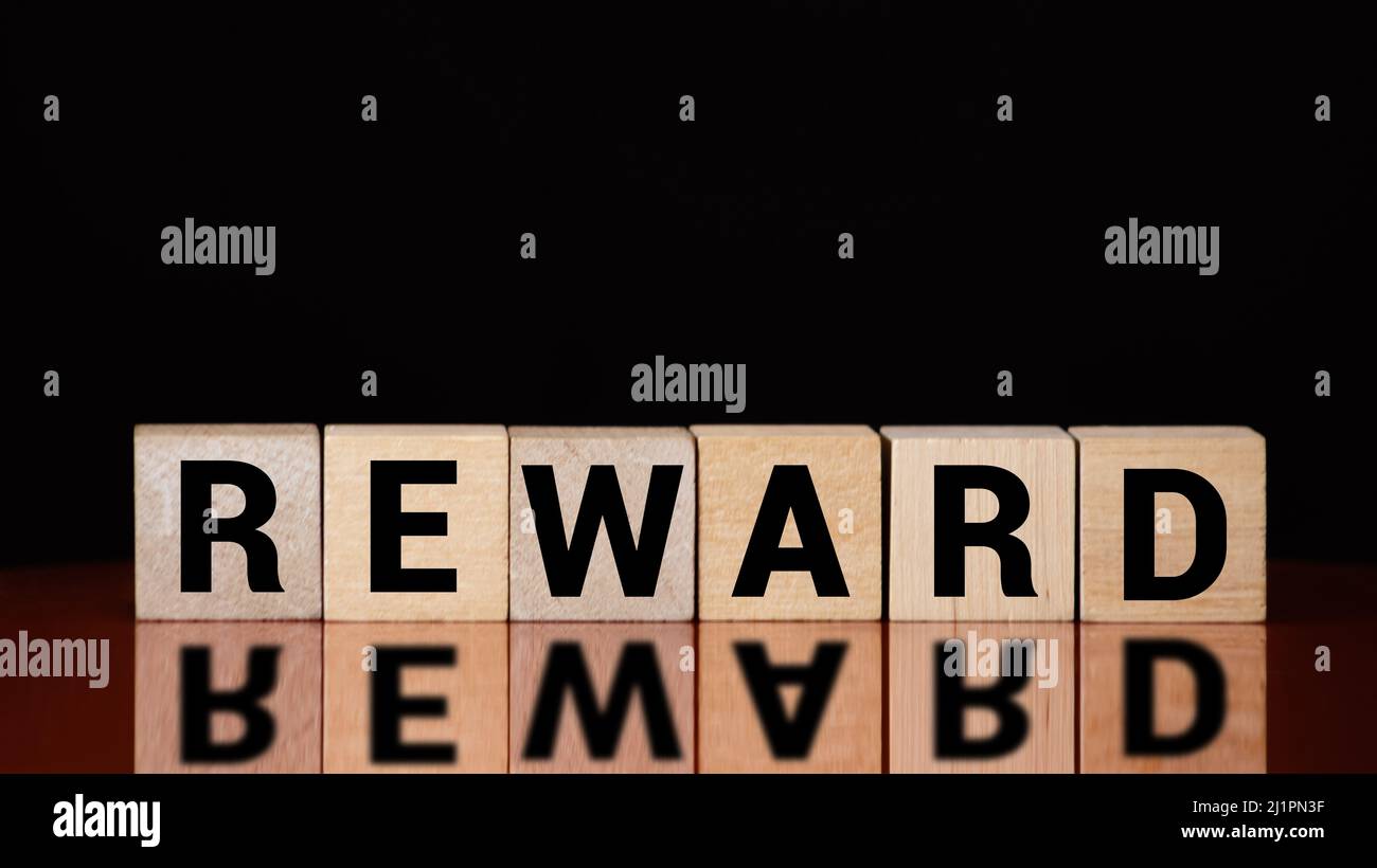 REWARD word made with building blocks, concept Stock Photo - Alamy
