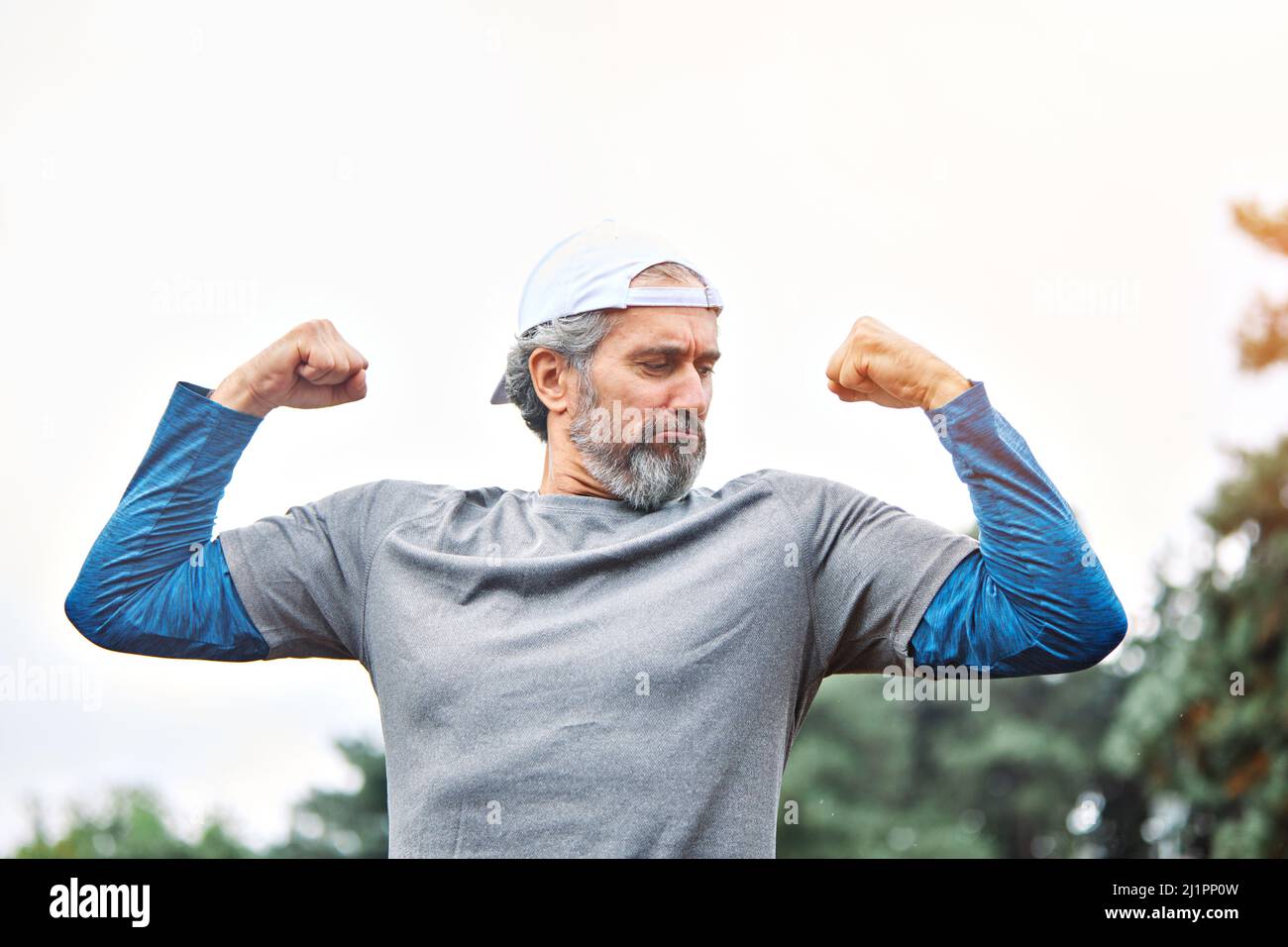 senior man running exercising sport fitness active fit Stock Photo - Alamy