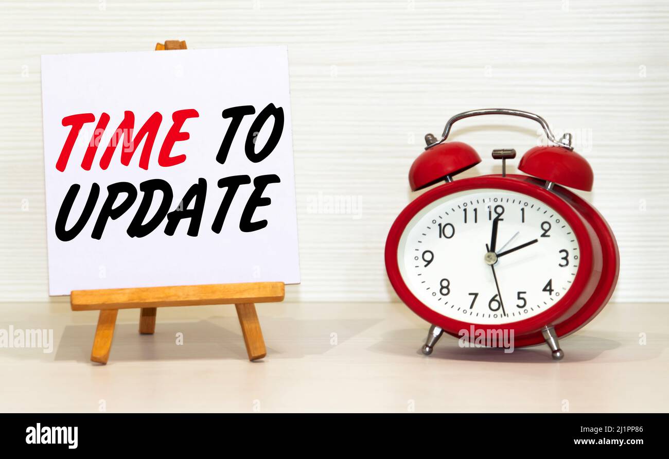 Alarm clock and text Time to Update. Time to Update concept. Time to ...