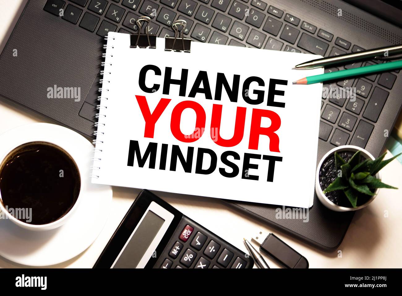 White blank notepad on office wooden table Change your mindset concept Stock Photo - Alamy