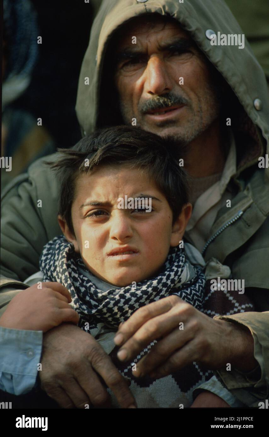 Kurdish Refugee father and son in Isik Veren Mountain Stock Photo - Alamy