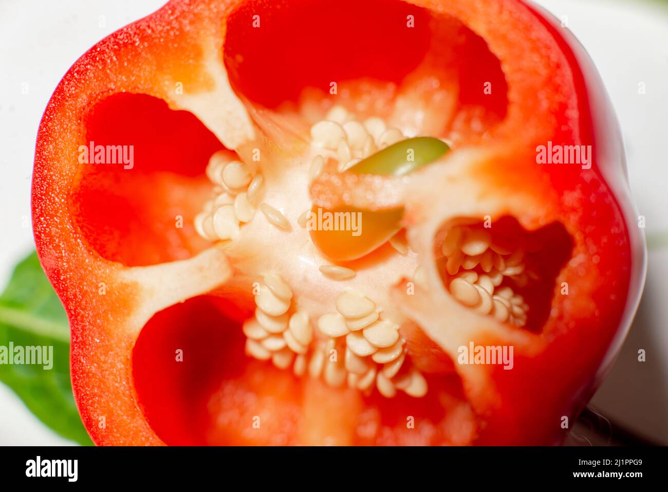 Red sweet pepper super macro. View inside. Bell pepper seeds close-up ...