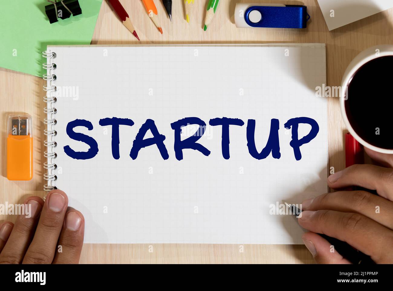 Human hand writing word STARTUP, business concept Stock Photo - Alamy
