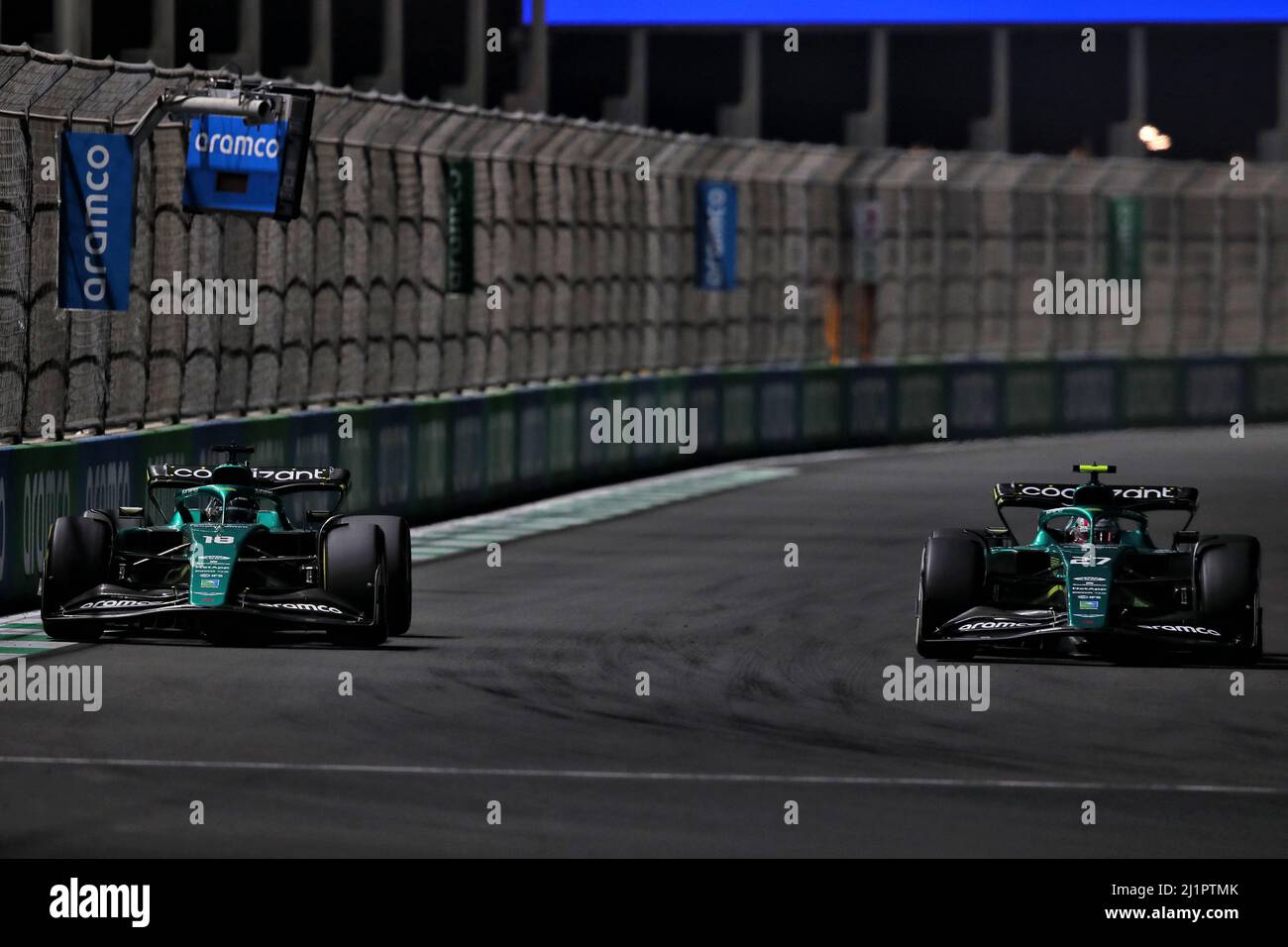 Lance Stroll (CDN) Aston Martin F1 Team AMR22 and Nico Hulkenberg (GER ...