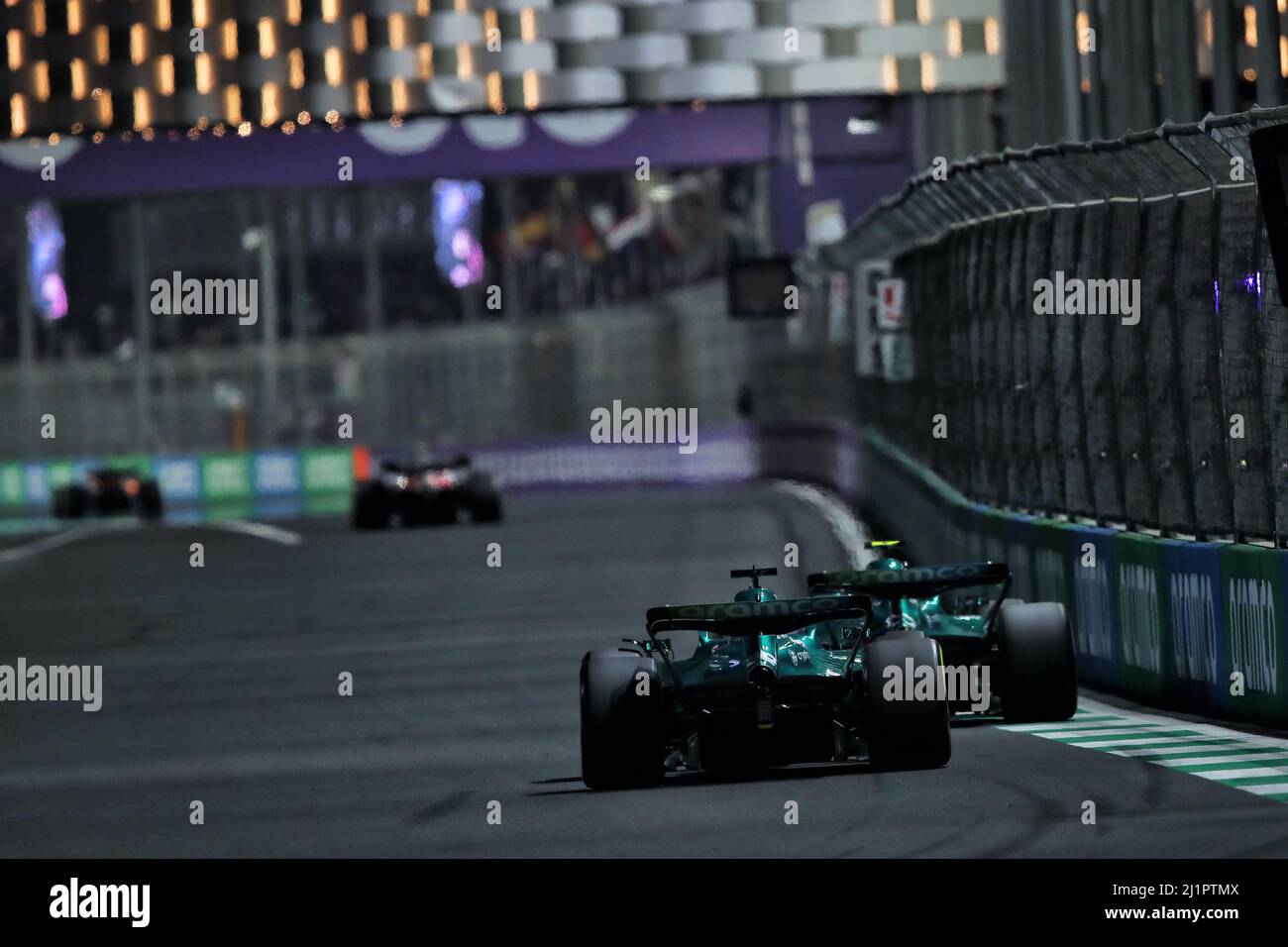 Lance Stroll (CDN) Aston Martin F1 Team AMR22 and Nico Hulkenberg (GER ...