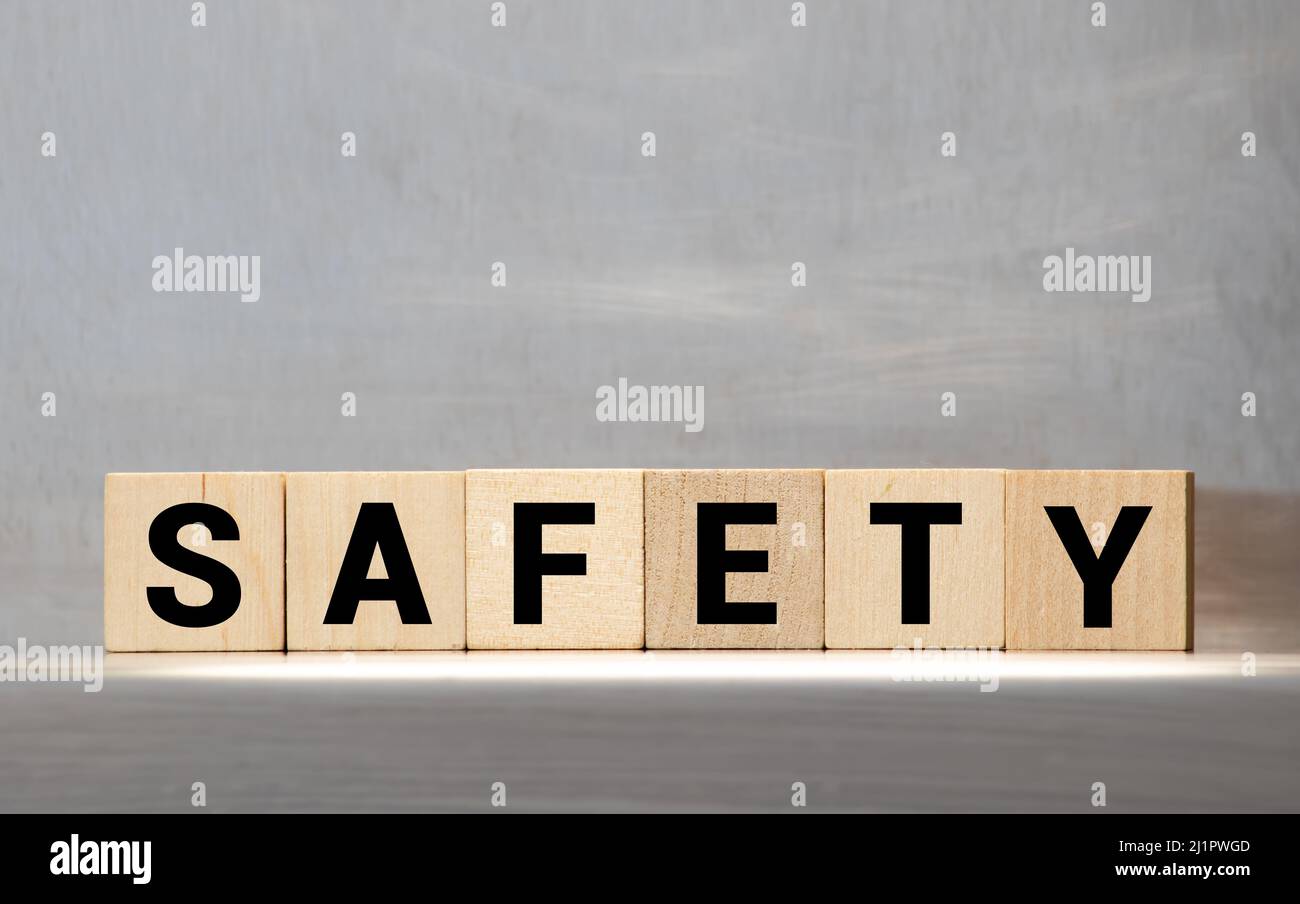 safety word written on wood block, business concept Stock Photo - Alamy