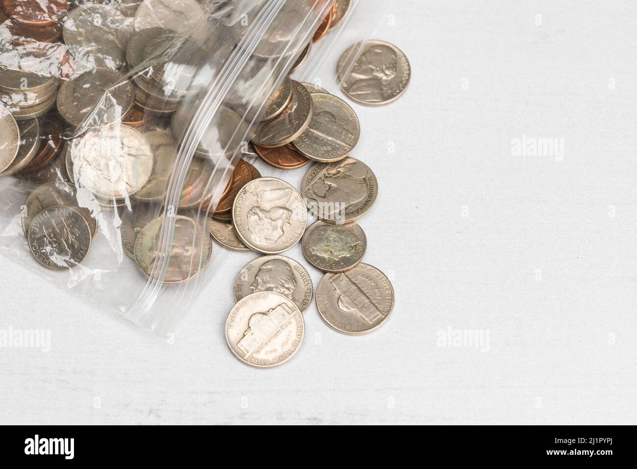 Coins bag pouring hi-res stock photography and images - Alamy