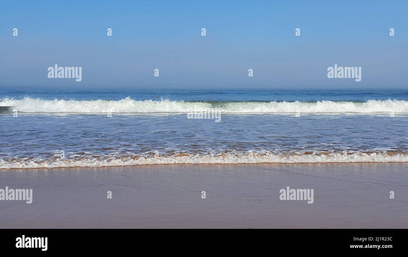 Mist over sea and sand Stock Photo - Alamy