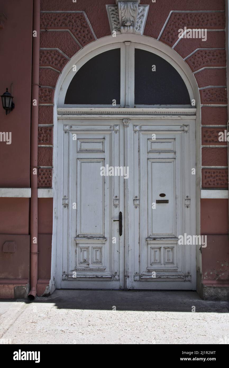 Beautiful big wooden door in the old preserved city street Stock Photo ...