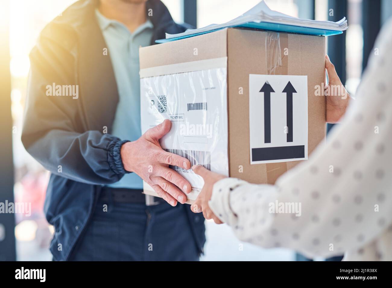 Delivered, directly into your hands. Cropped shot of an unrecognizable ...