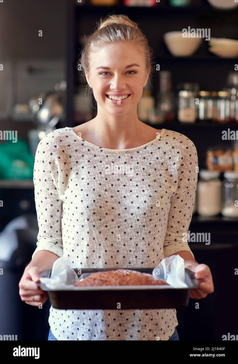 Woman holding loaf of bread hi-res stock photography and images - Alamy