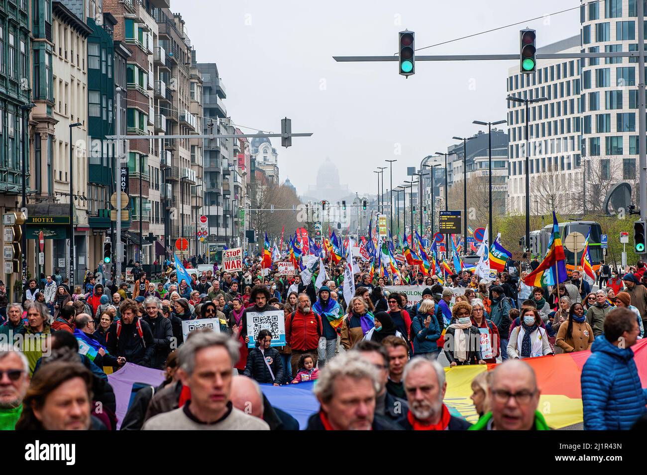 Brussels, Belgium. 27th Mar, 2022. Thousands of protesters are seen ...