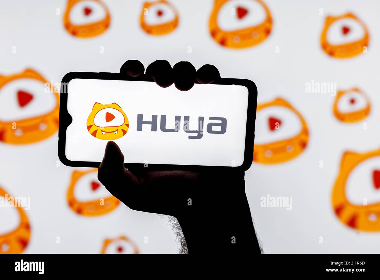Smartphone With The Huya Live Streaming Service Logo On The Screen In