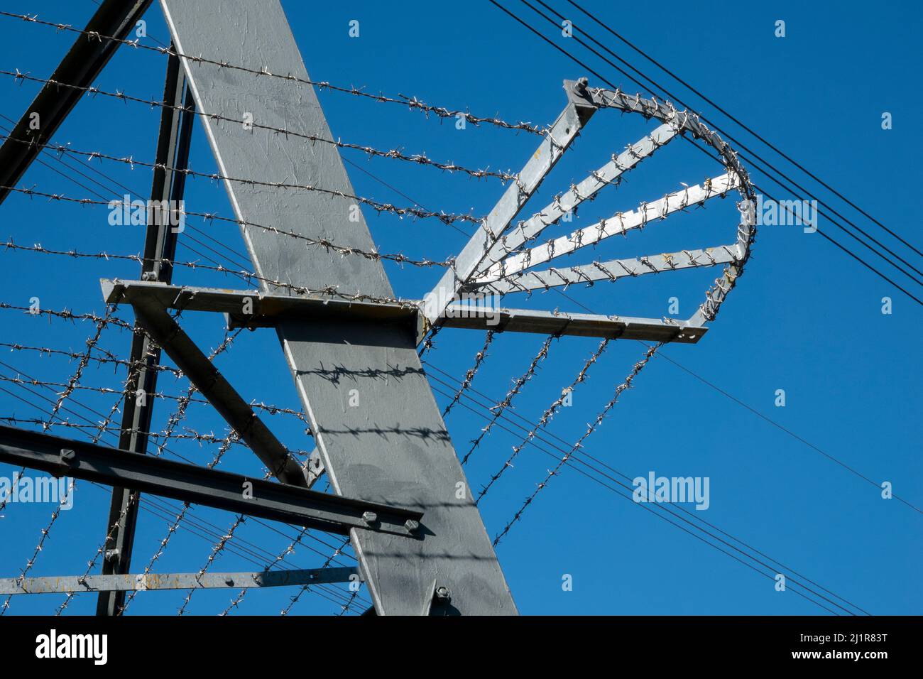 Lower section of a transmission tower with 'Danger of Death' warning ...