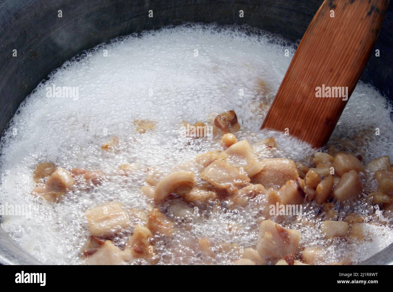 Frying pork greaves cvarci from pig fat, traditional way Stock Photo ...