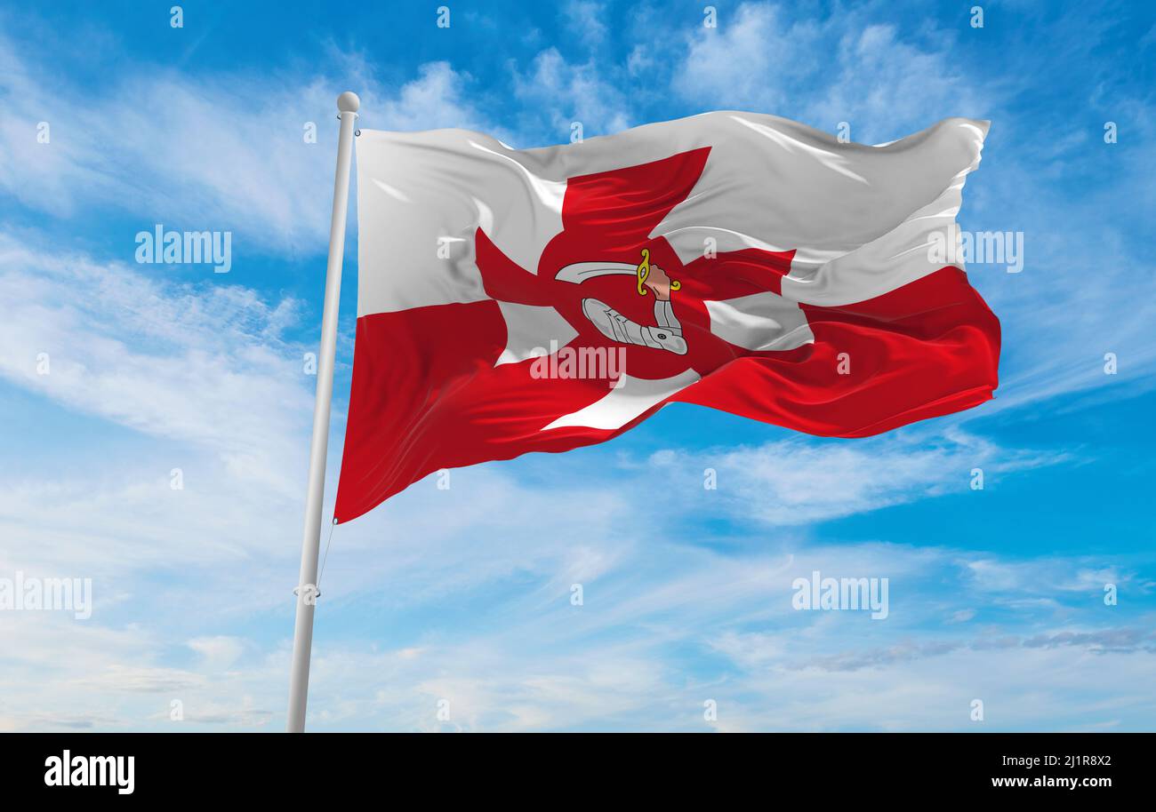 flag of Naval Jack , Poland at cloudy sky background on sunset ...
