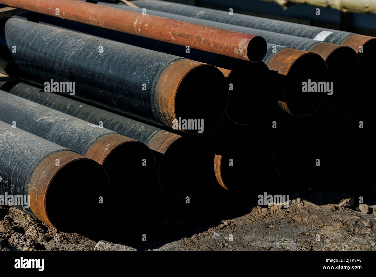 many big pipes on the ground. industrial pipes for sewerage Stock Photo ...