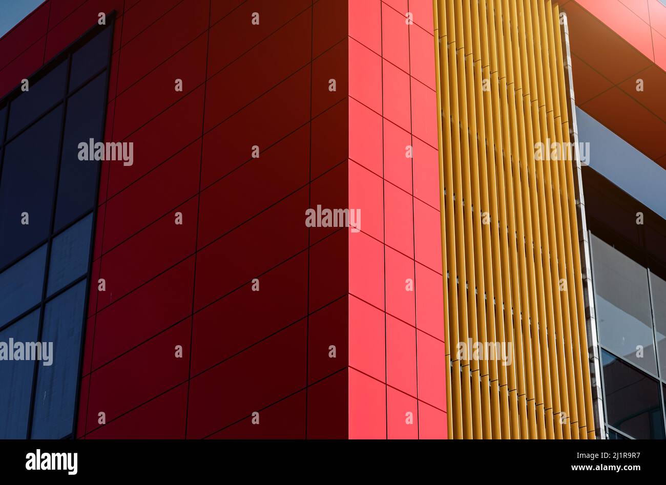 modern office center red building with geometric line. bright ...