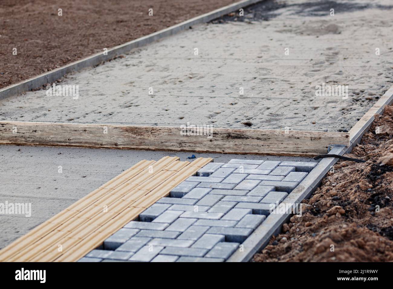 paving slabs on construction site. paving stones for laying paths Stock ...