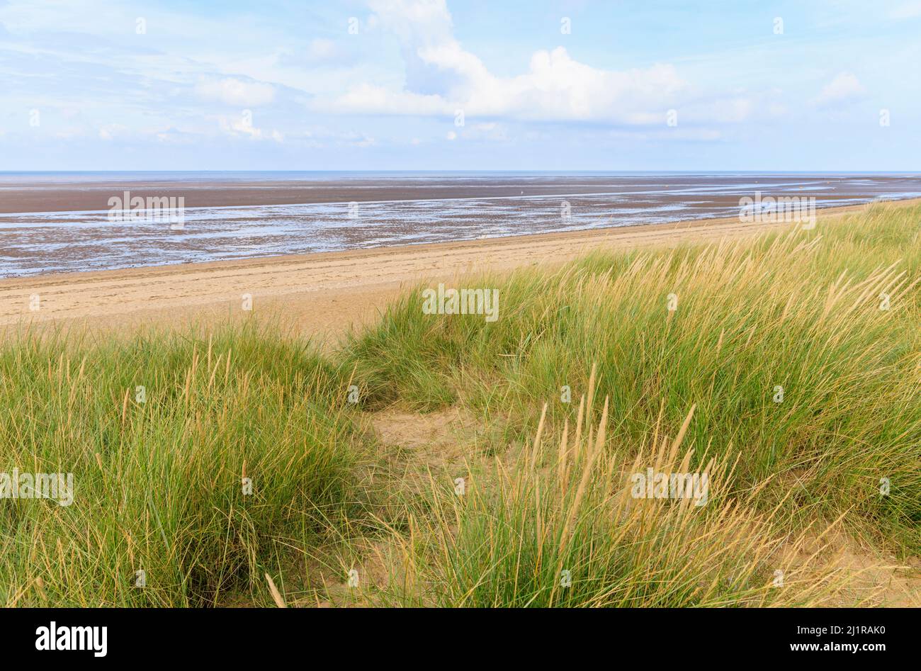 Sand dunes and coast path at Heacham North Beach, a coastal village in ...