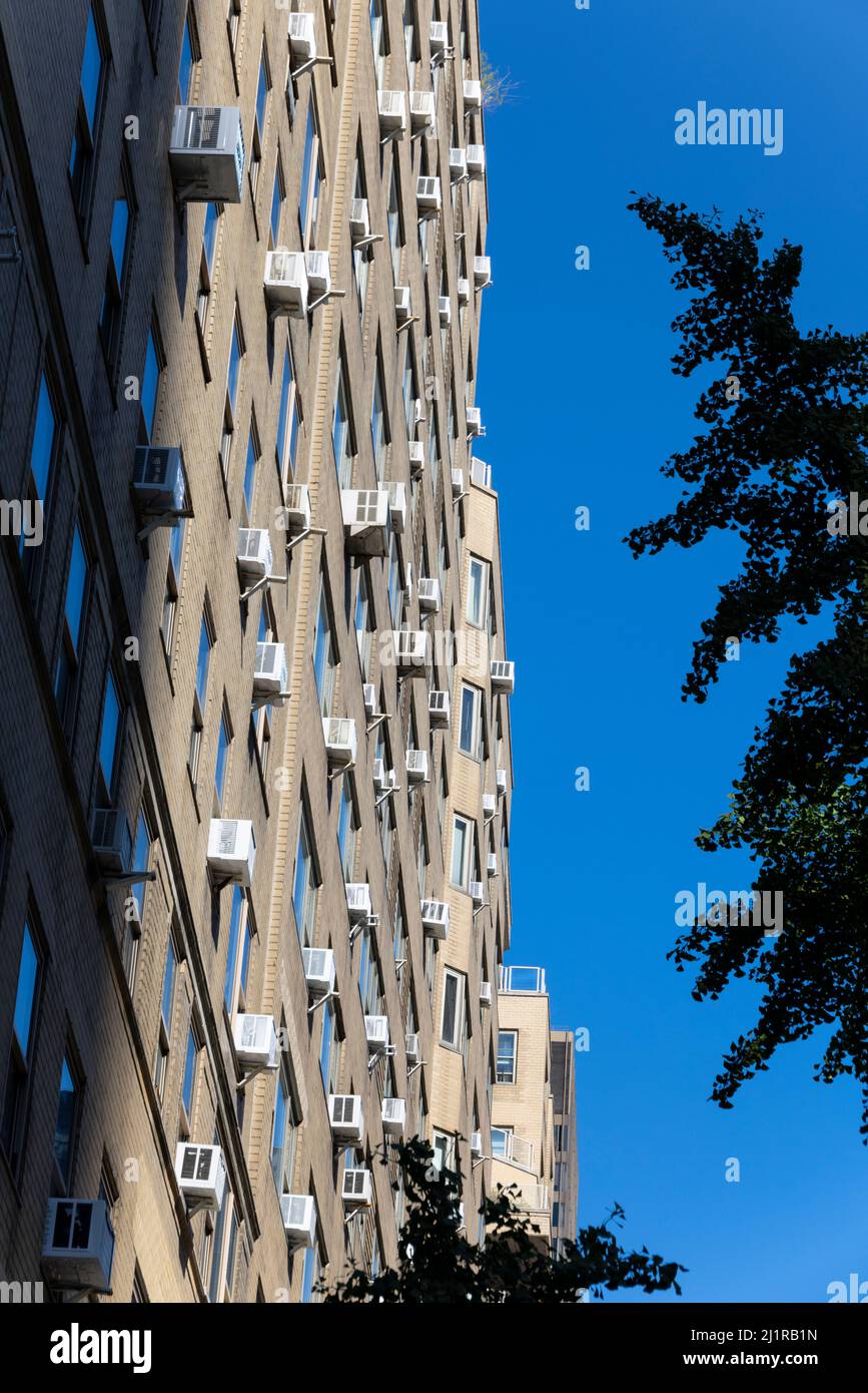 Many air conditioners installed at windows of residential buildings NYC ...