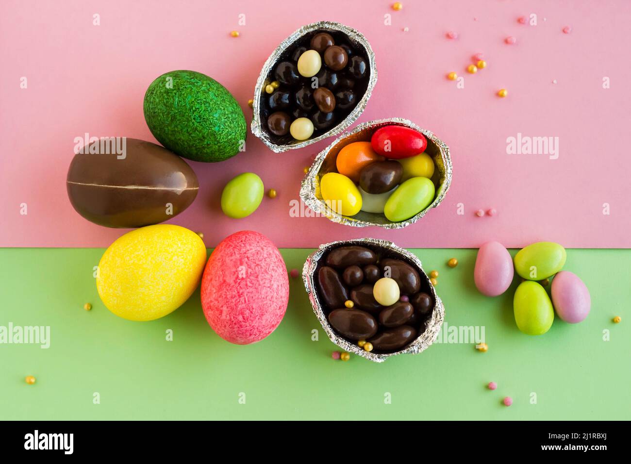 Decorative colored Easter Eggs and colorful candies,chocolates designed ...