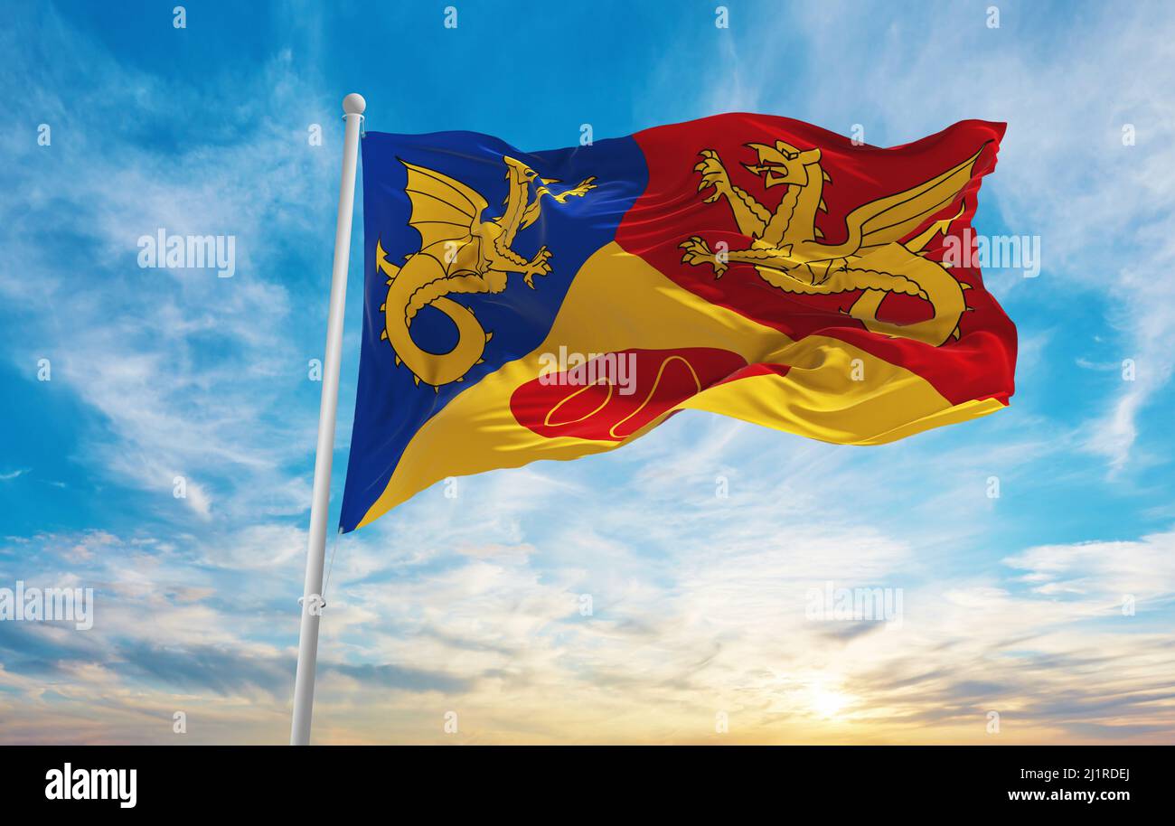 flag of Craig y Dorth , UK at cloudy sky background on sunset, panoramic view. County of united ...