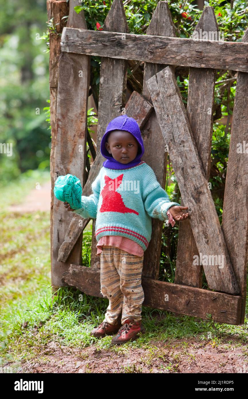 A child stands beside his gate, Meru, Kenya Stock Photo - Alamy
