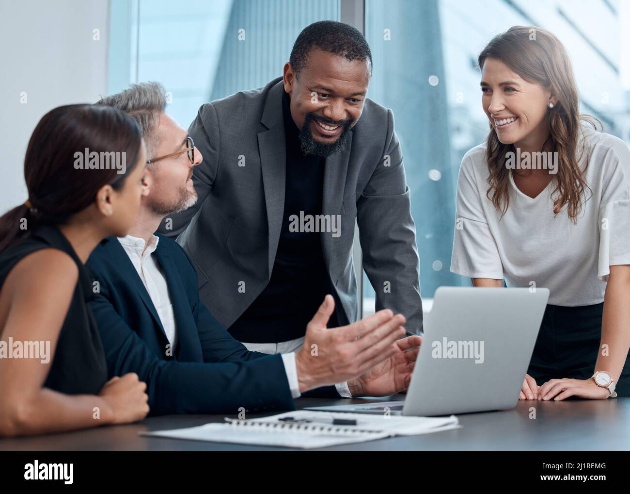 Working on a master plan. Cropped shot of a group of corporate business ...