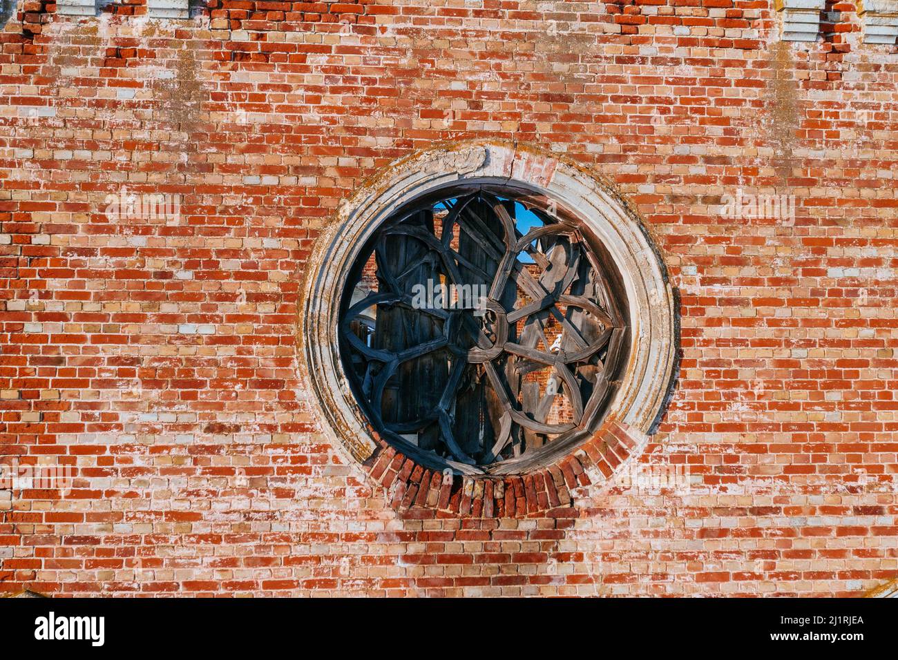Round broken stained glass window in old abandoned church Stock Photo ...
