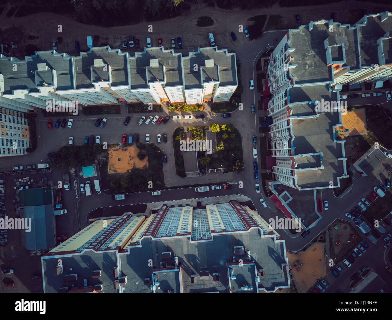 Drone view of new building complex in city center with houses Stock ...