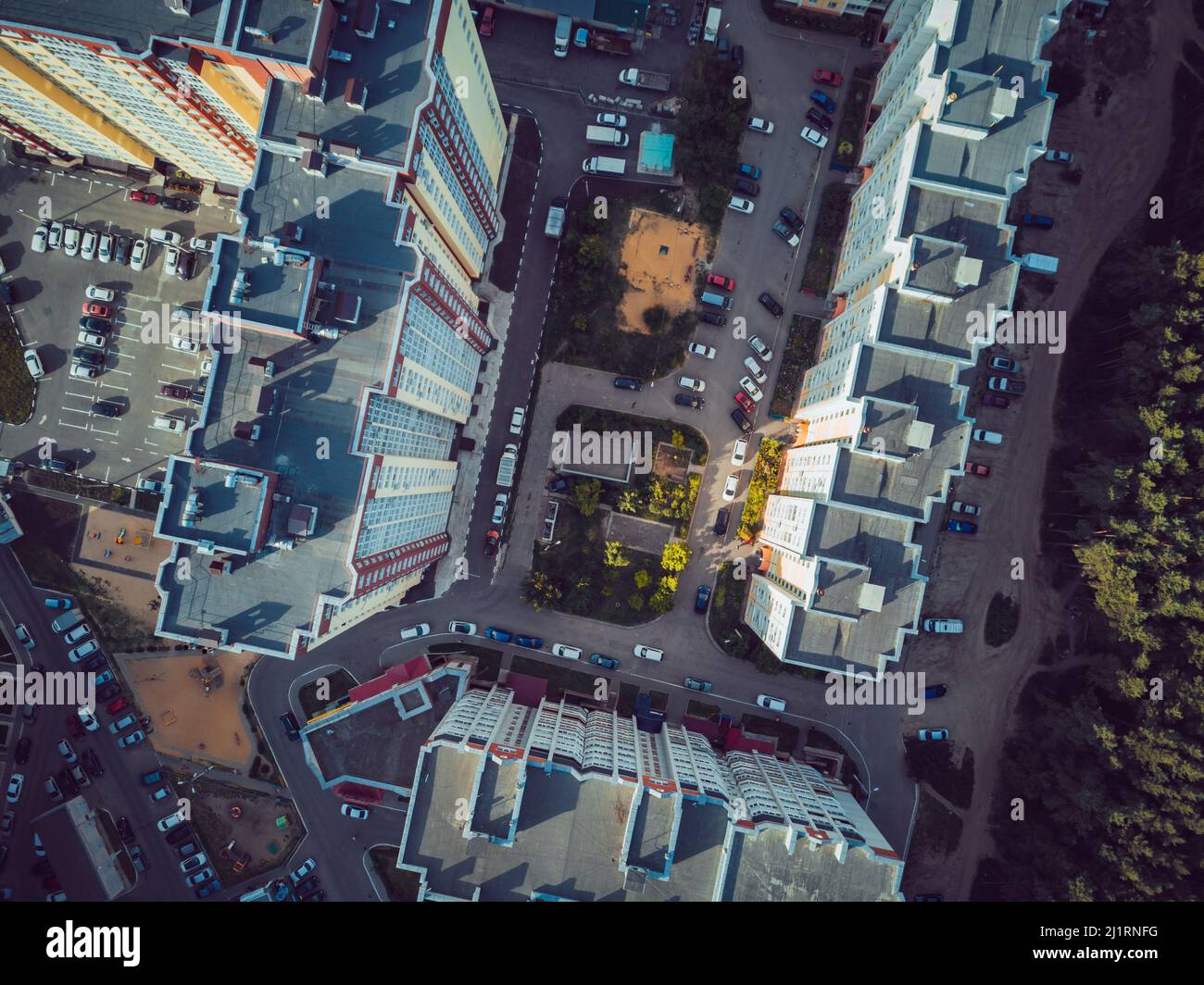 Drone view of new building complex in city center with houses Stock ...