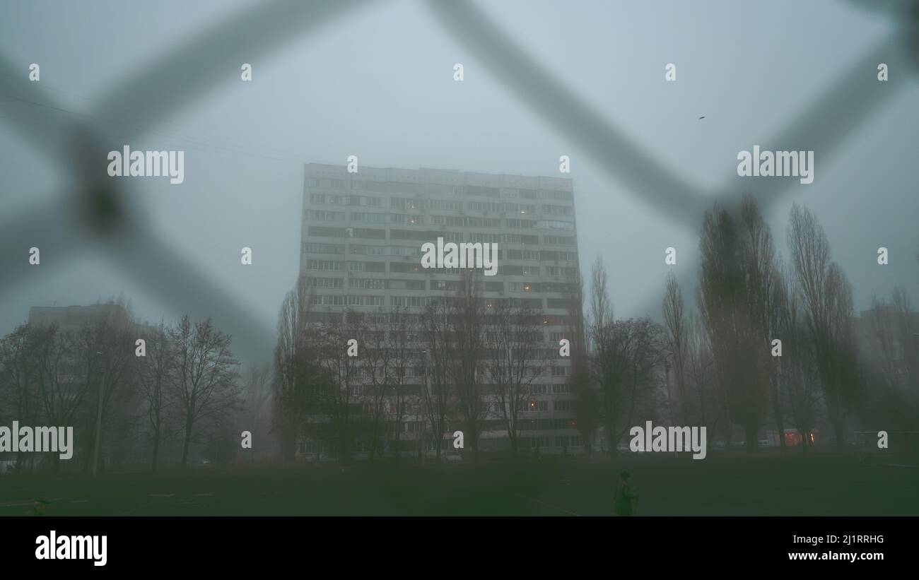 Modern apartment buildings in the morning on the background of fog ...