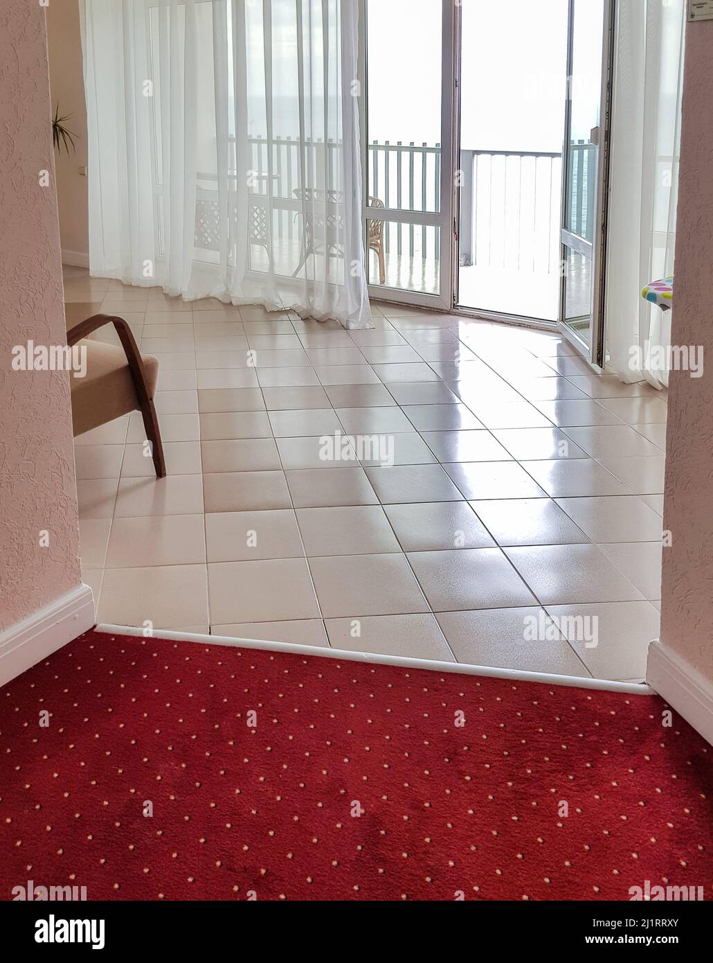 Modern interior of the hotel with a view of the panoramic window with a ...