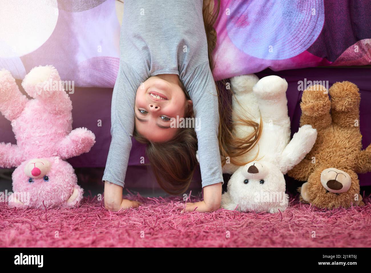 Seeing the world from a new perspective. Portrait of a cute little girl ...