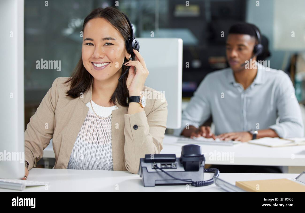 You couldnt be speaking to anyone better. Shot of a young woman using a ...