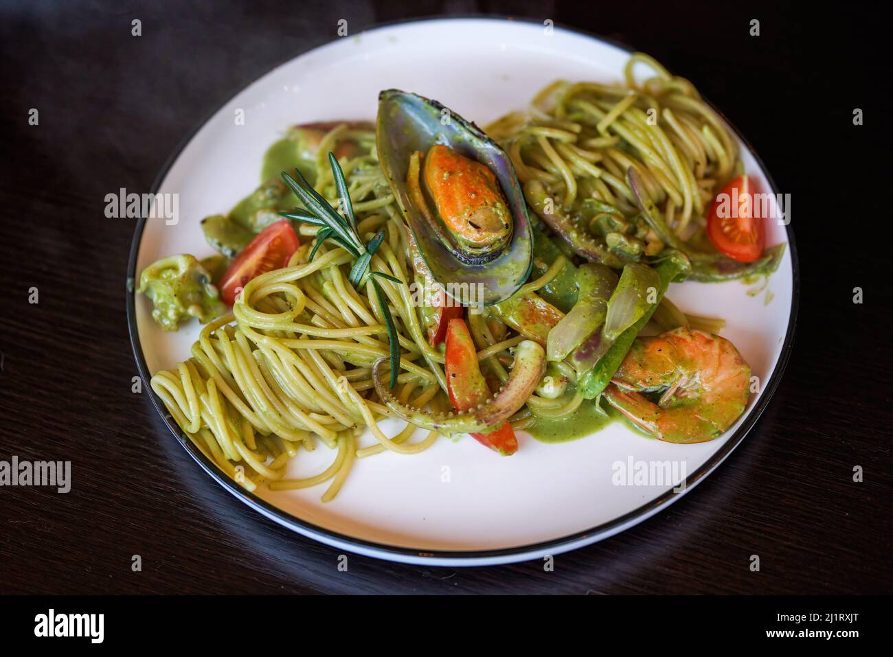 A delicious and delicious western food, seafood pasta with avocado ...