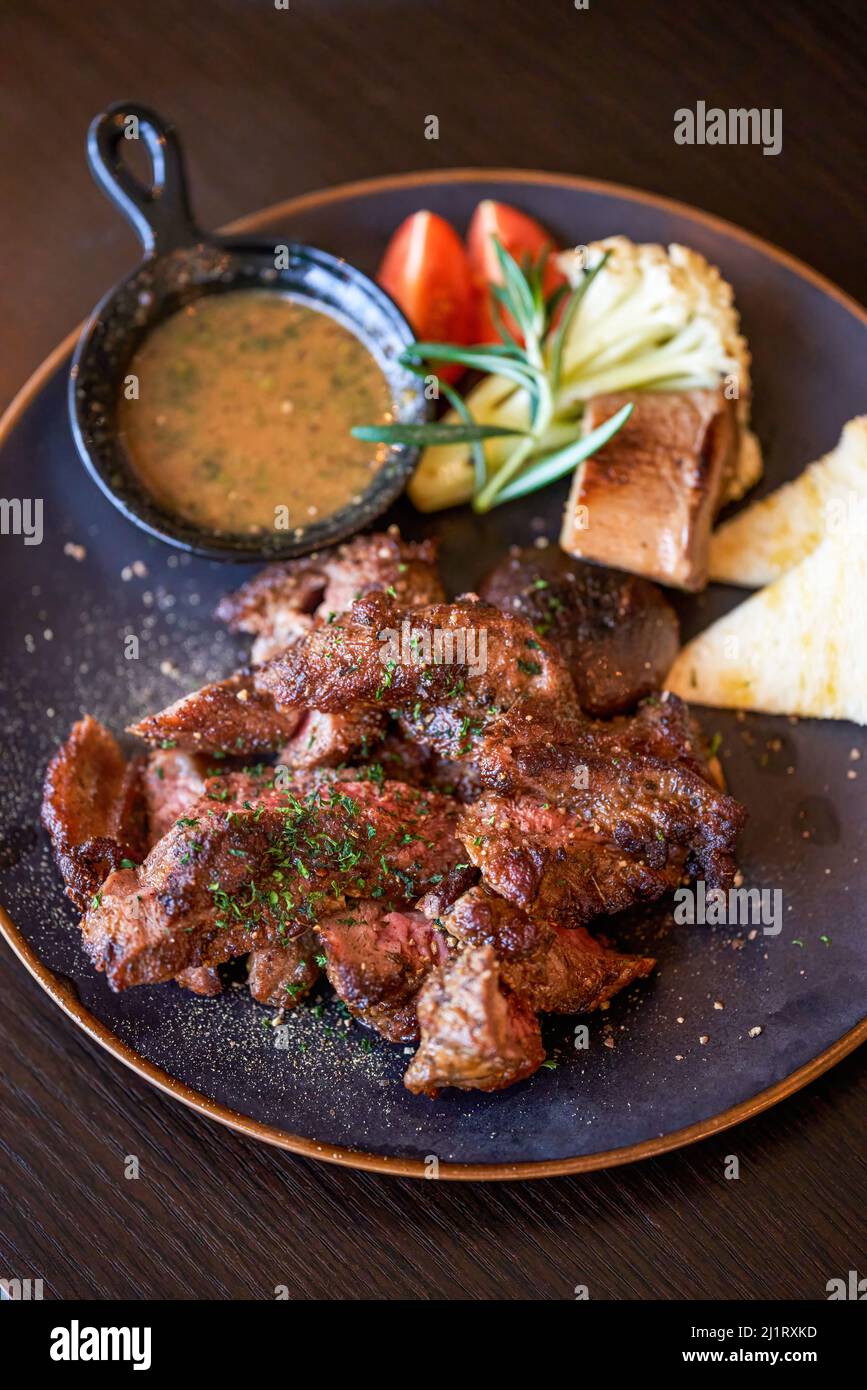 A delicious and tempting western steak, smoked grilled sirloin steak ...