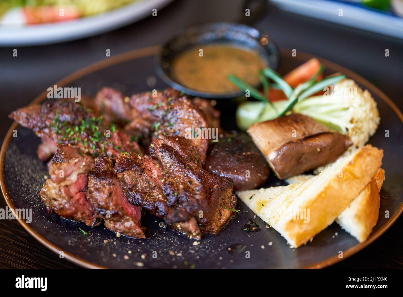 A delicious and tempting western steak, smoked grilled sirloin steak ...
