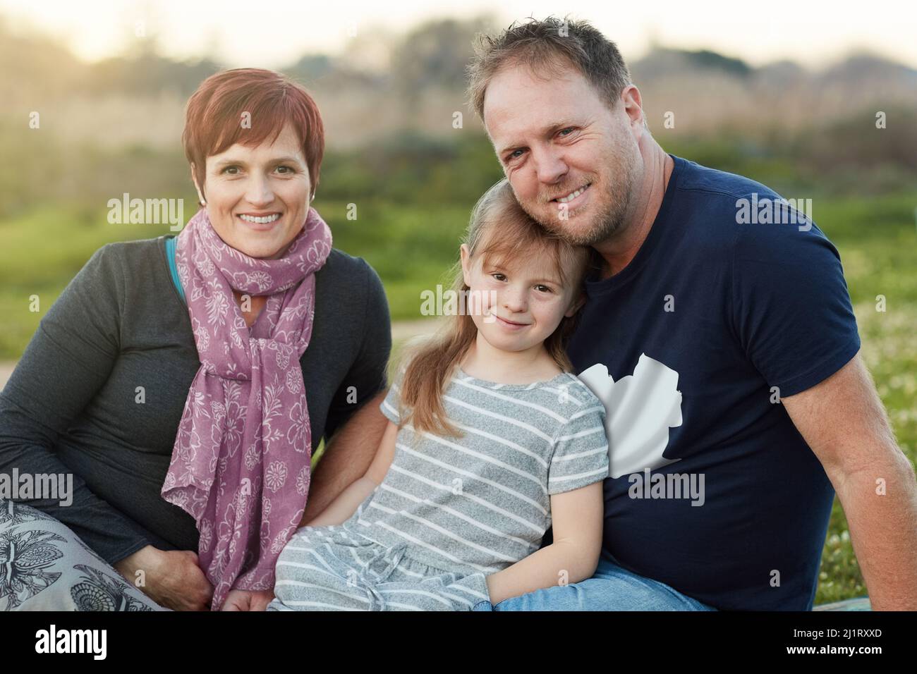We love each other no matter what. Portrait of a cute little girl and ...