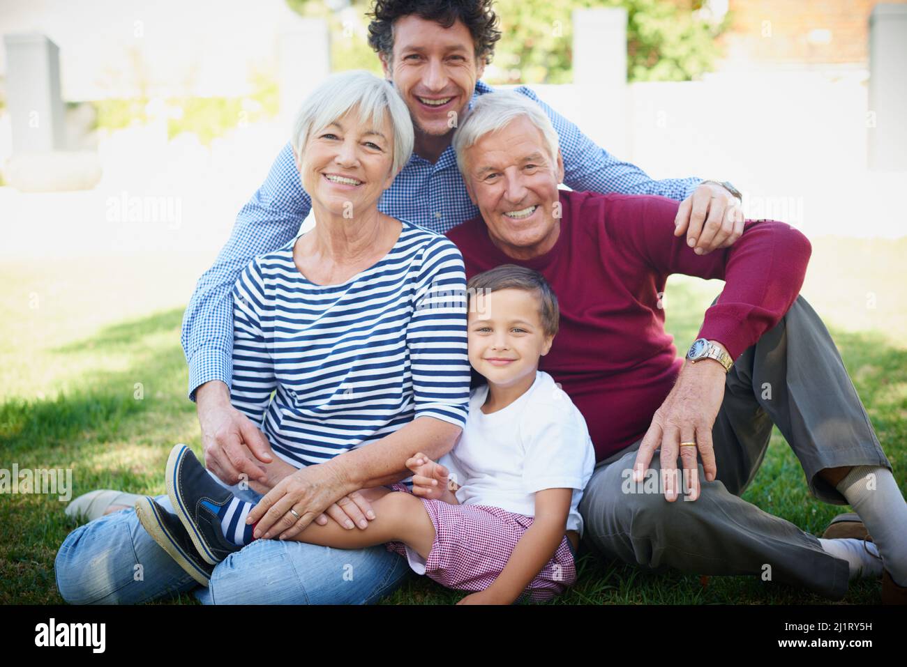 He loves his grandparents. Cropped portrait of a multi-generational ...